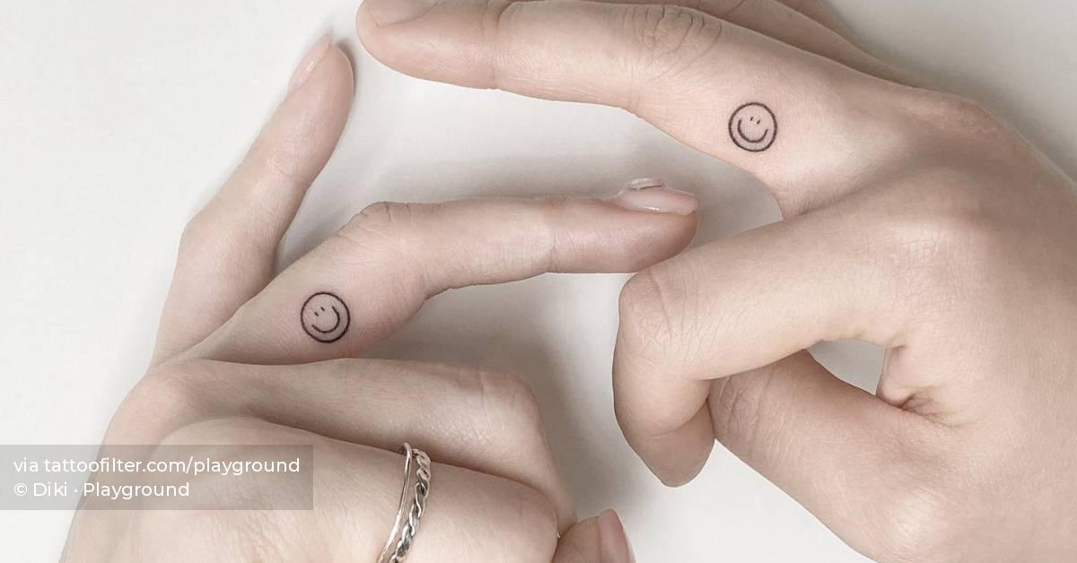 Matching smiley face tattoo for best friends,