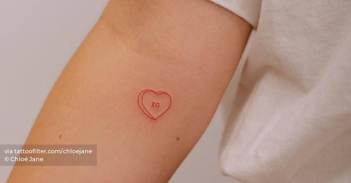 Sweetheart tattoo located on the inner forearm, fine