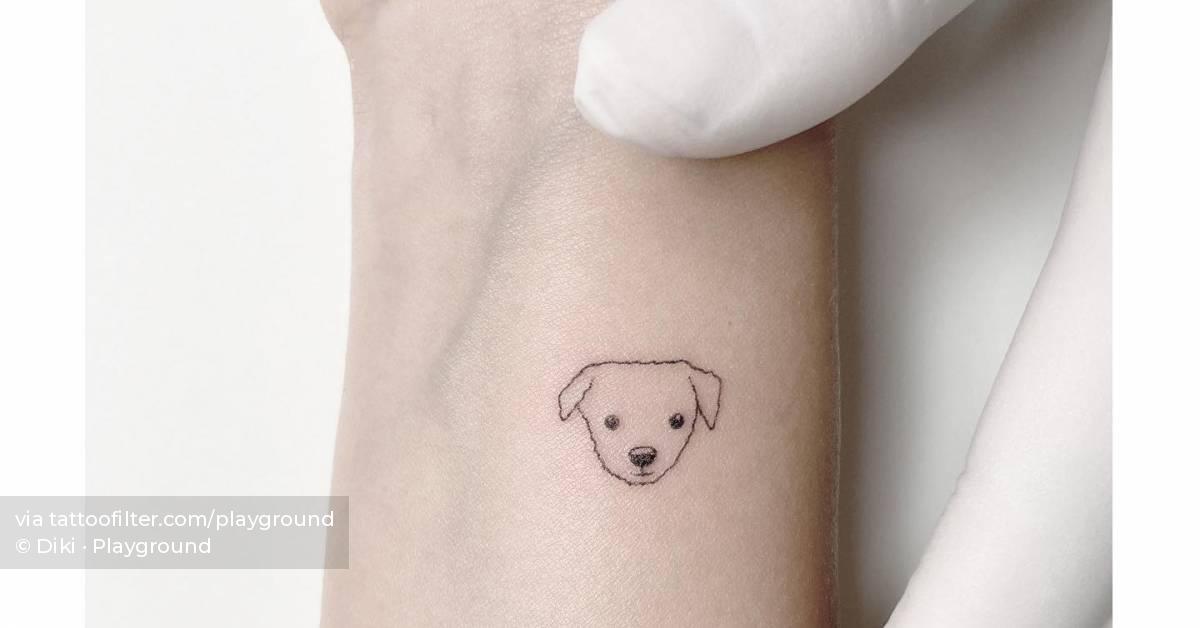 Minimalistic style dog portrait tattoo located on the