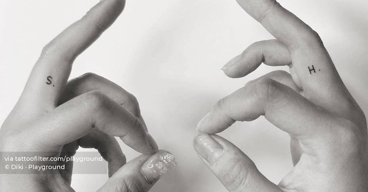 Matching initials tattoo for best friends.