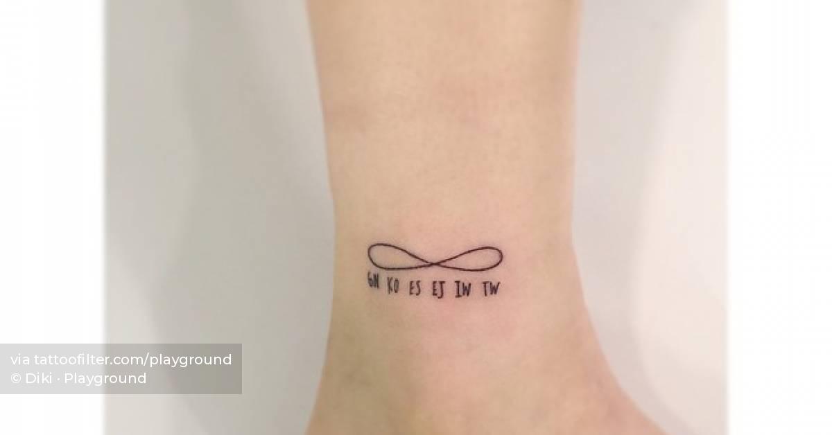 Infinity symbol and initials tattooed on the ankle.