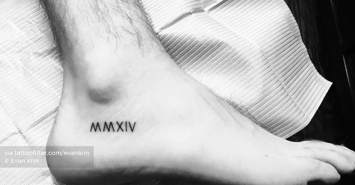 "MMXIV" tattoo located on the ankle.
