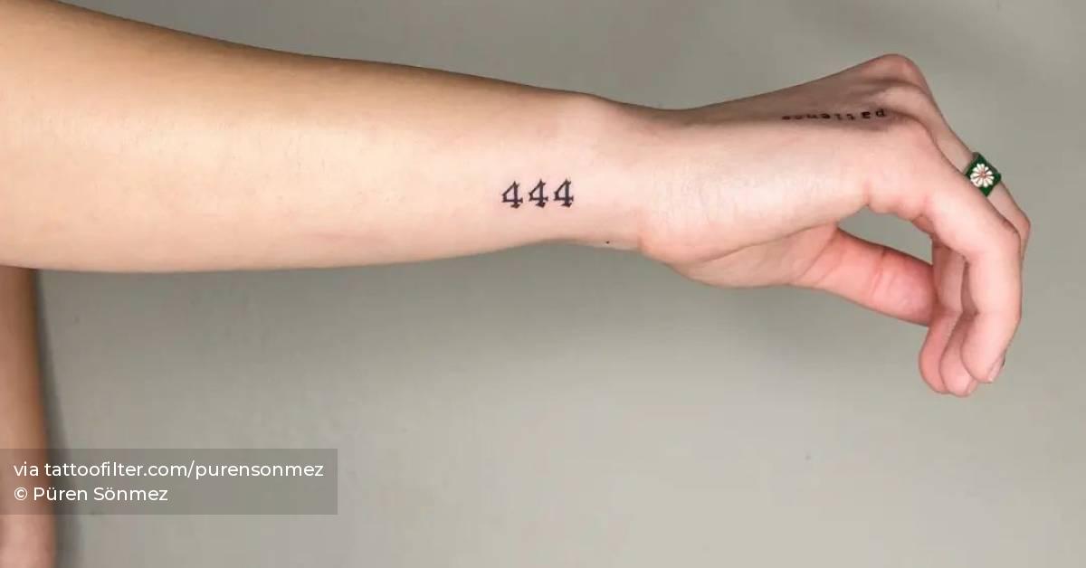 "444" lettering tattoo located on the wrist.