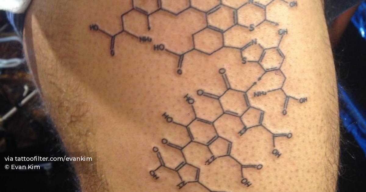 Chemical structure tattoo located on the thigh.