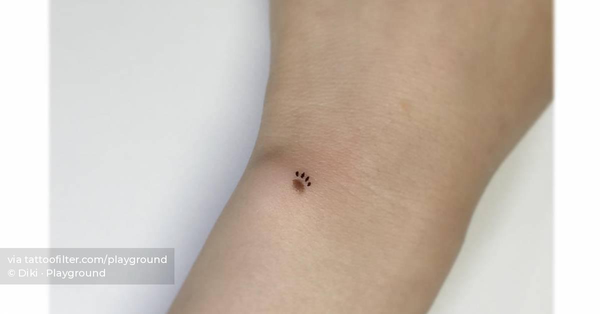 Micro dog paw birthmark cover up tattoo done on the