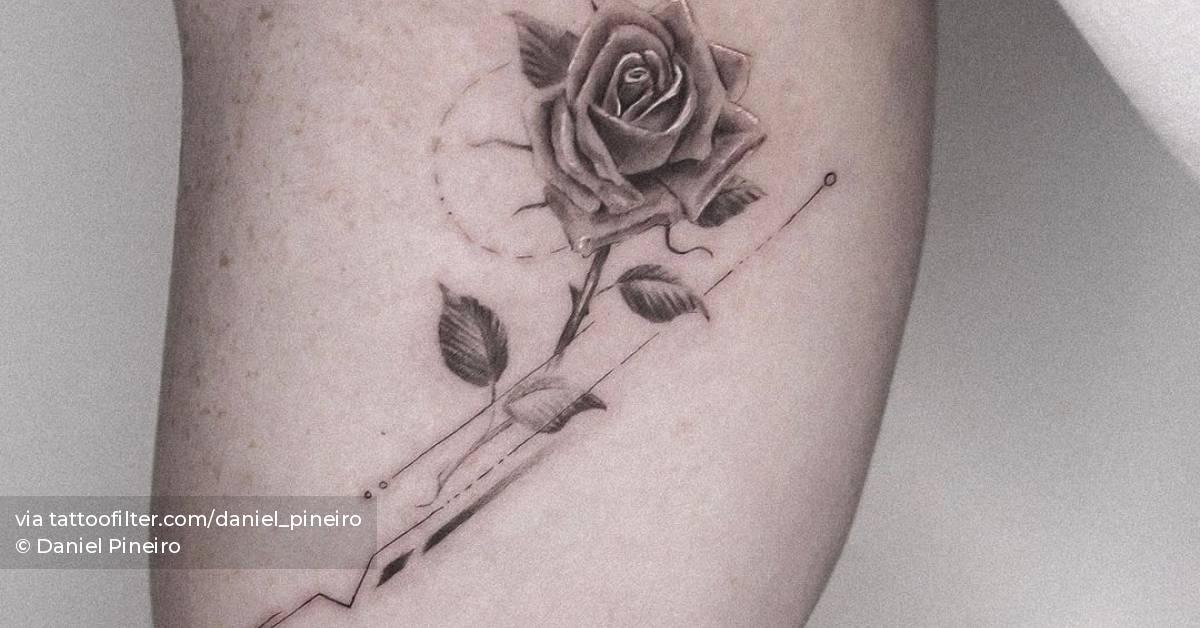 Micro-realistic style rose tattoo located on the inner