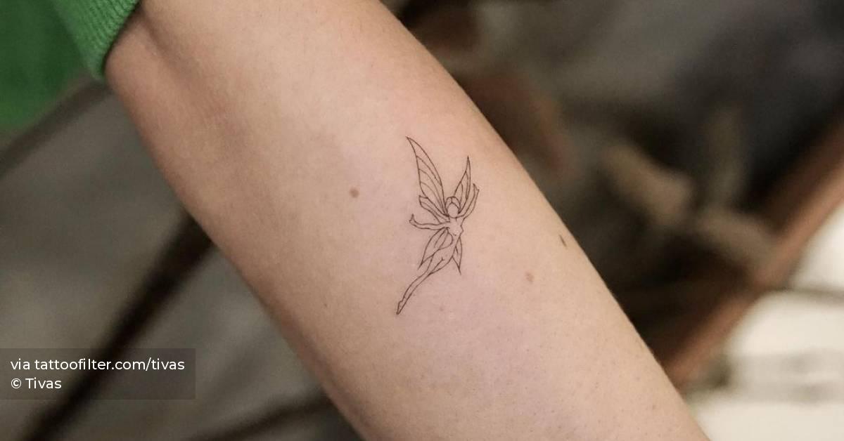 Fine line style fairy tattoo located on the forearm.