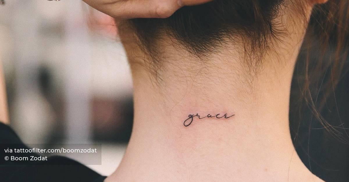 "Grace" lettering tattoo done on the back of the neck.