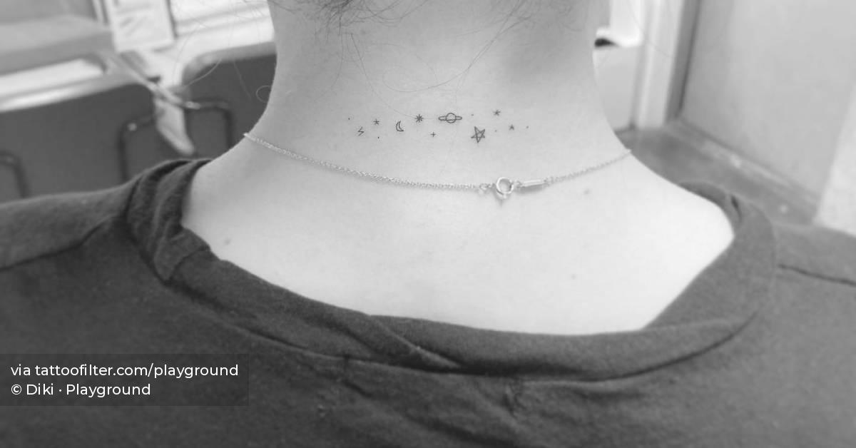 Minimalistic style universe tattoo located on the back