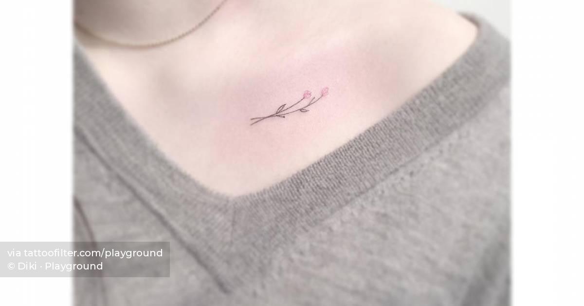 Minimalistic style flower tattoo located on the