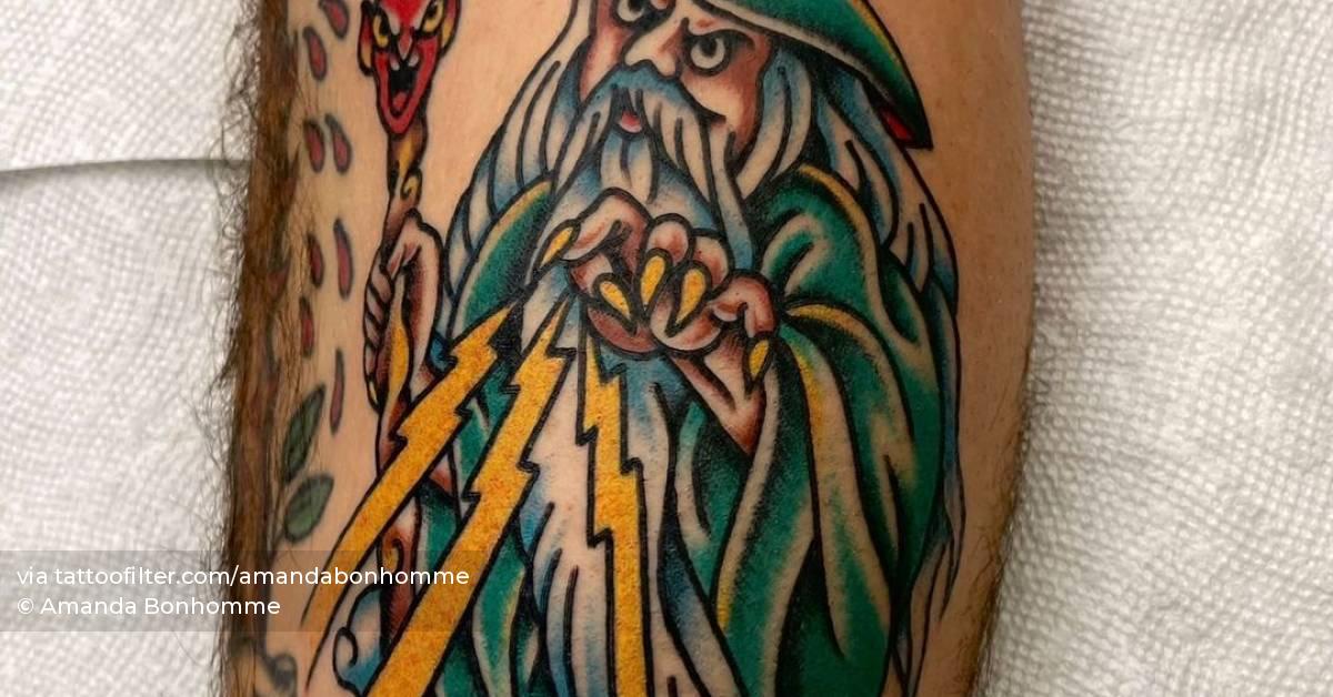 Traditional style wizard tattoo placed on the calf.