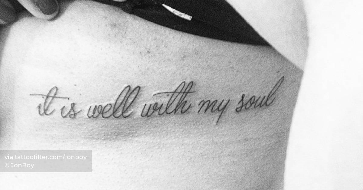 "It is well with my soul" lettering tattoo located on