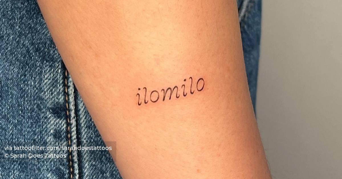 "Ilomilo" lettering tattoo located on the forearm.