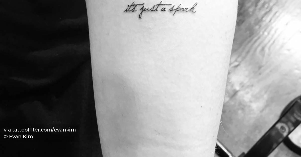 "It's just spark" lettering tattoo handwritten on the