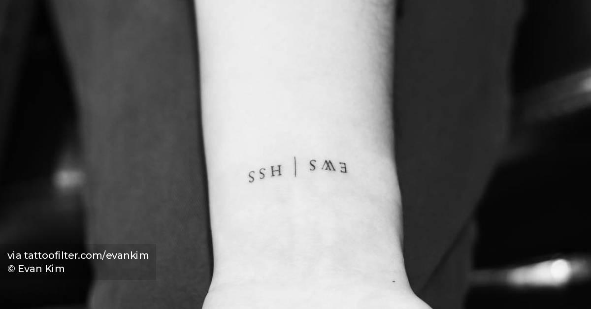 Initials "EWS | HSS" tattooed on the wrist.