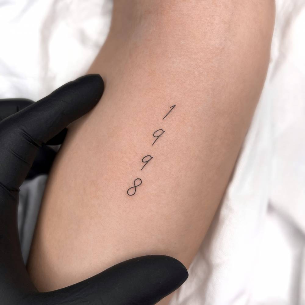 1998 Lettering Tattoo Placed On The Inner Forearm 1998 Lettering Tattoo Placed On The Inner Forearm