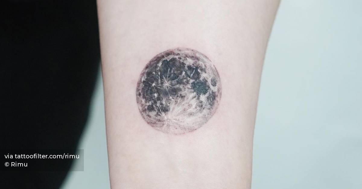Micro-realistic style full moon tattoo placed on the