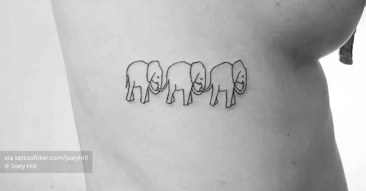 Fine line style elephant family tattoo located on the