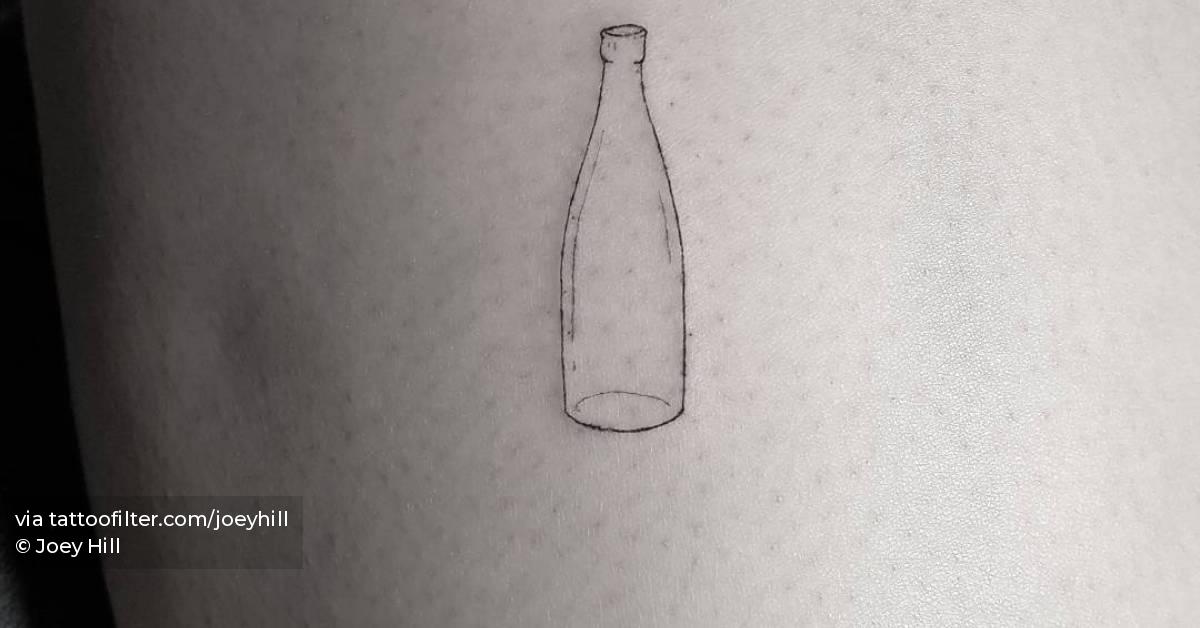 Fine line minimalistic bottle tattoo located on the