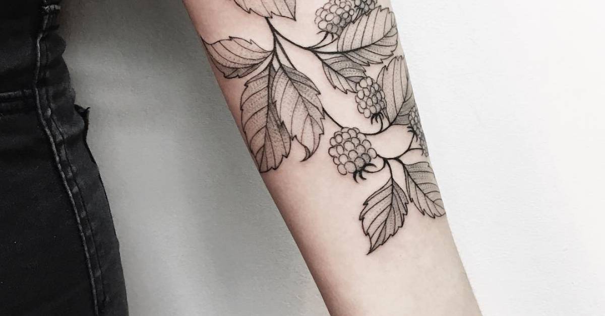 Rasberry tattoo located on the inner forearm,