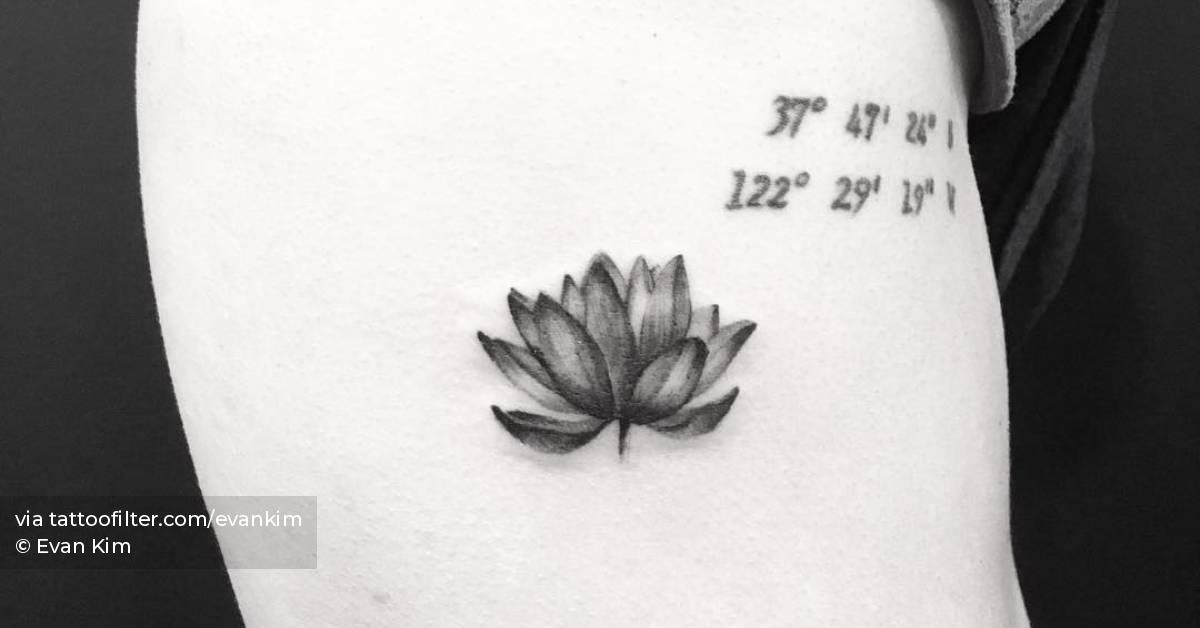 Lotus flower tattoo placed on the rib.