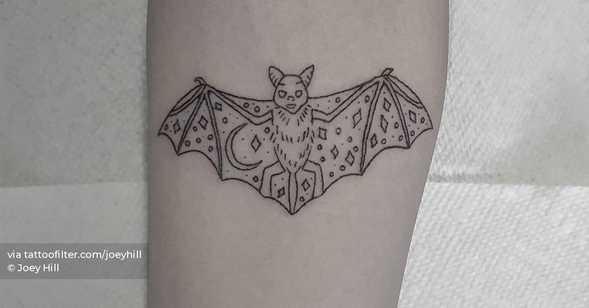 Fine line style bat tattoo located on the inner