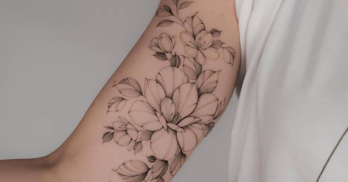 Beautiful magnolia tattoo located on the inner arm.