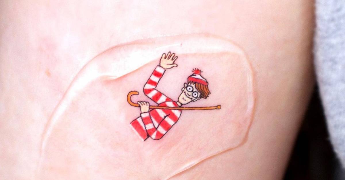 Wally tattoo located on the inner arm, cartoon style.