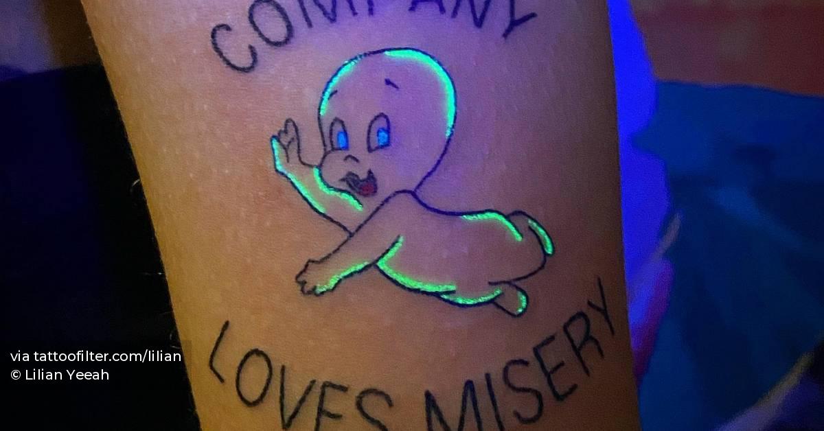 Casper and "company loves misery" tattooed on the inner
