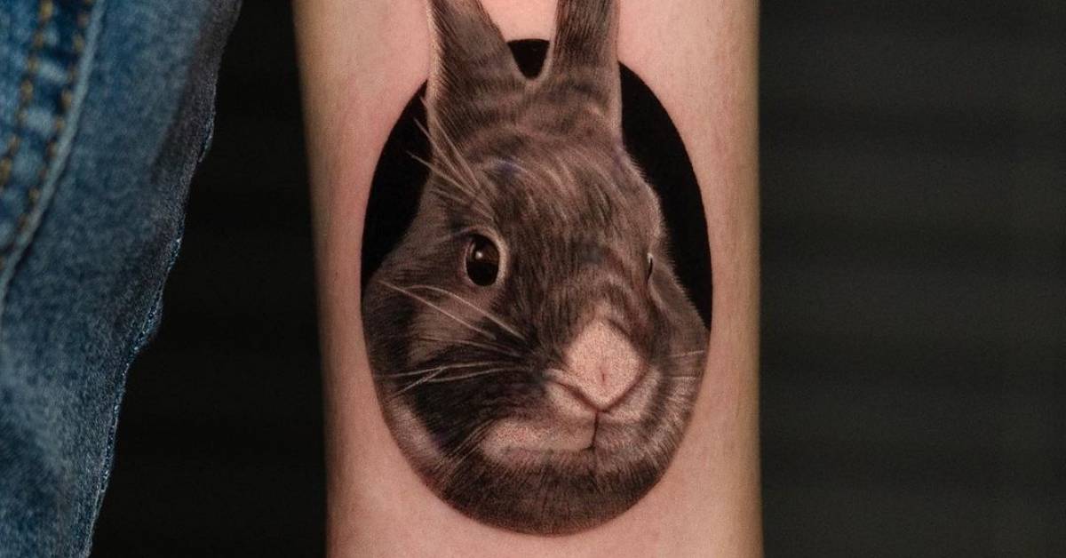 Bunny portrait tattoo located on the bicep,