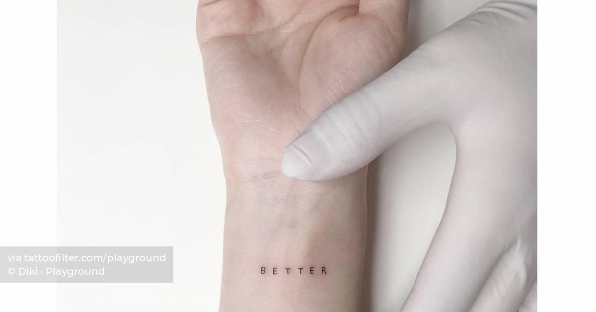 "Better" lettering tattoo located on the wrist.