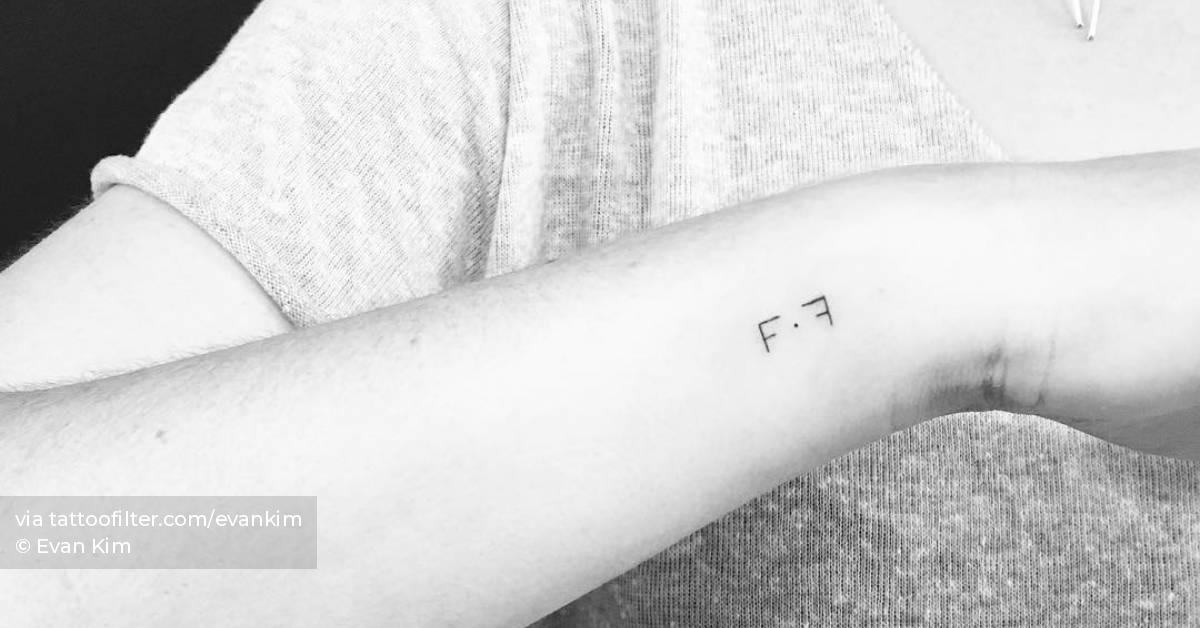 F.F initials tattooed on the wrist.