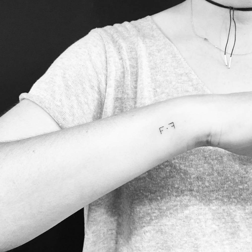 F F Initials Tattooed On The Wrist 