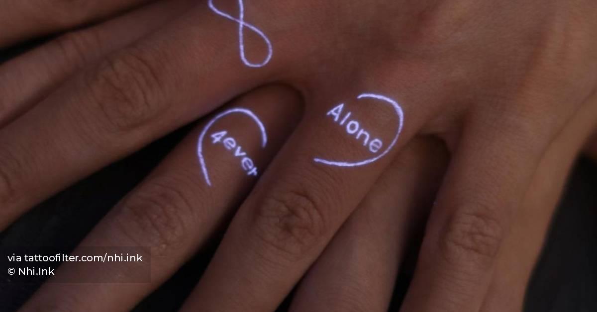 Individual matching "forever alone" lettering tattoo in