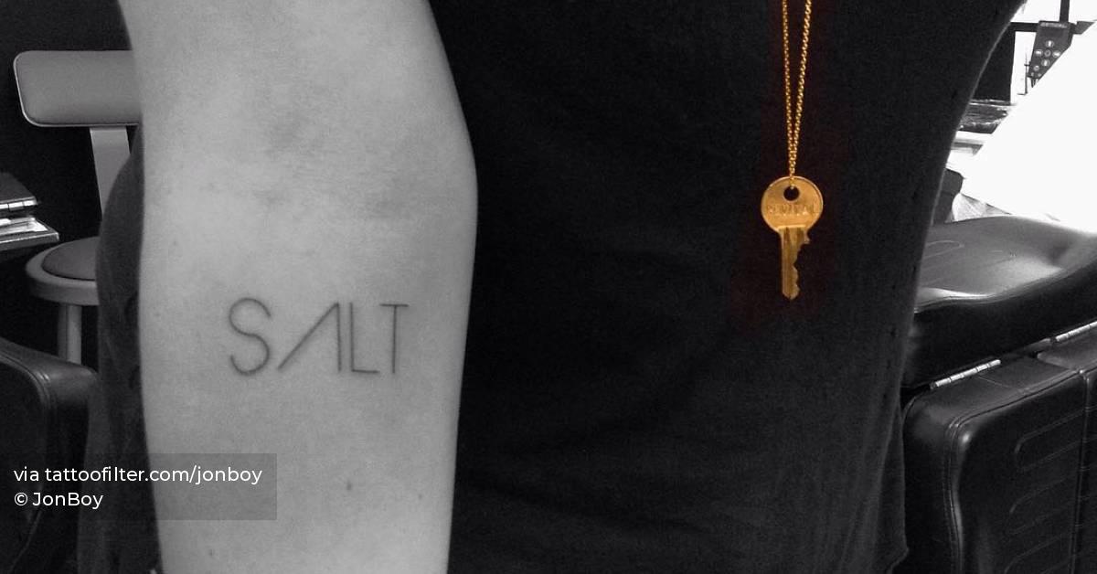 "Salt" lettering tattoo done on the inner forearm.