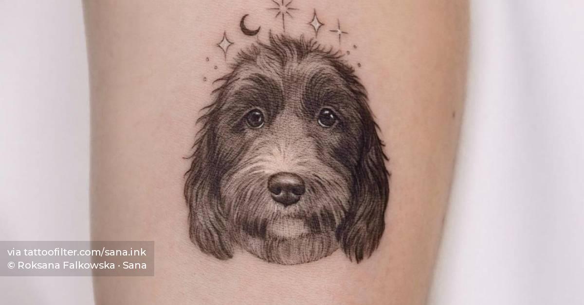 Micro-realistic style Cockapoo portrait tattoo located