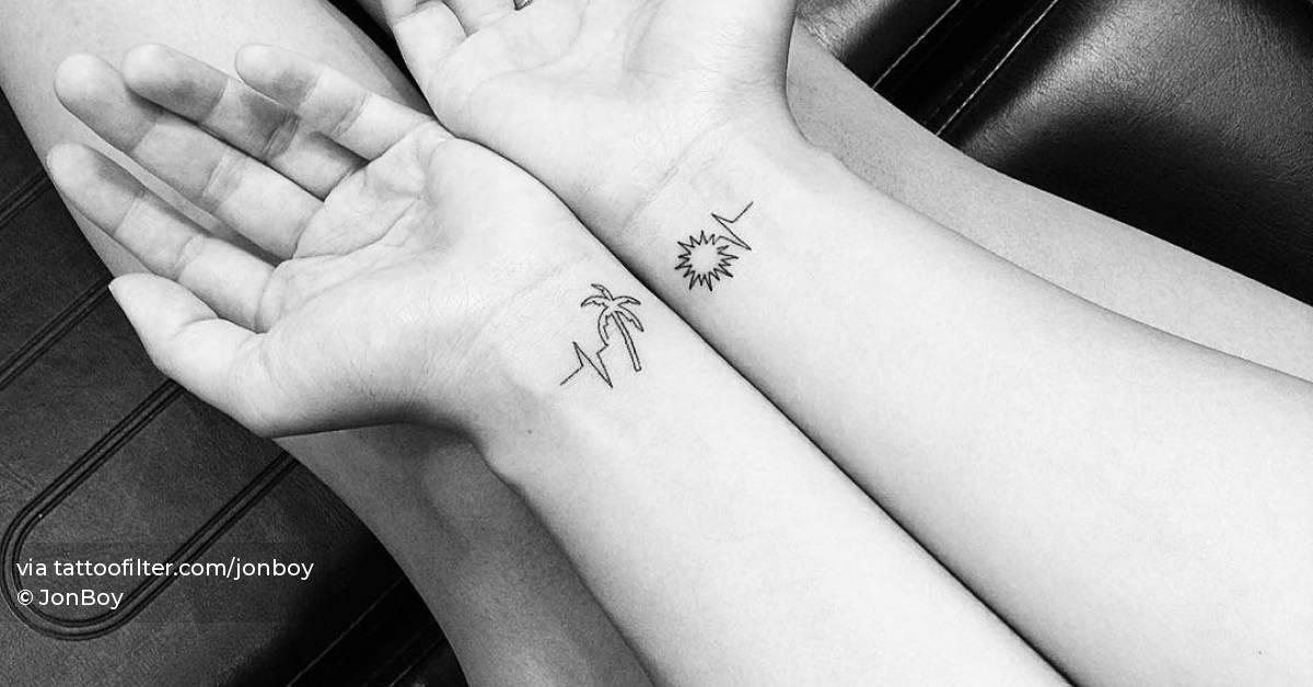 Individual matching heartbeat, palm tree and sun