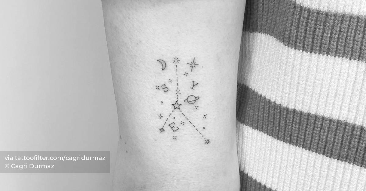 Cancer constellation and galaxy tattoo located on the