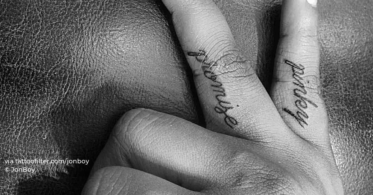 "Pinky promise" lettering tattoo located on the