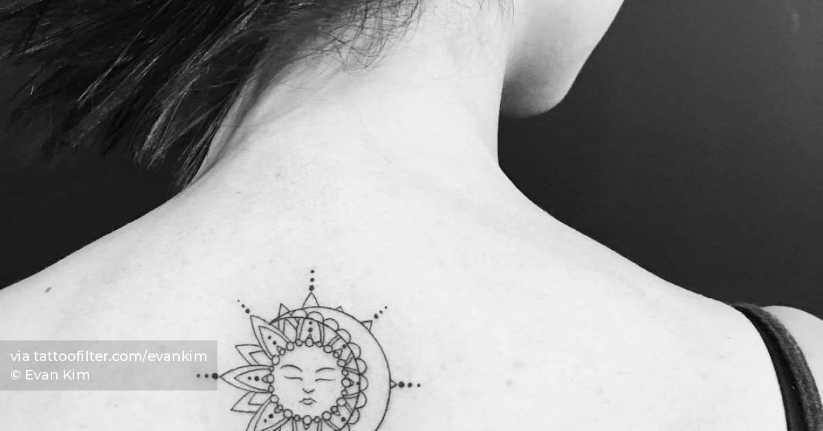 Fine line style eclipse tattoo located on the upper