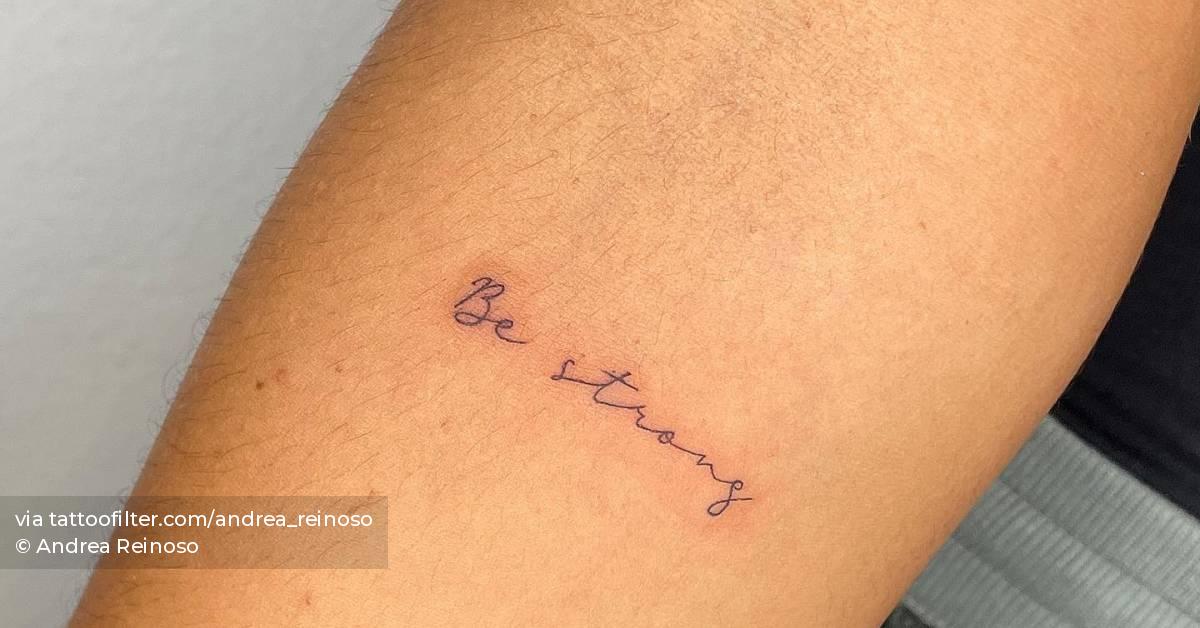 "Be strong" lettering tattoo located on the inner