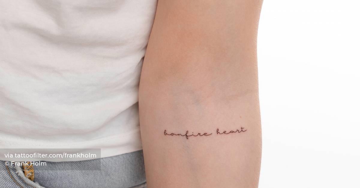 "Bonfire heart" lettering tattoo handwritten on the