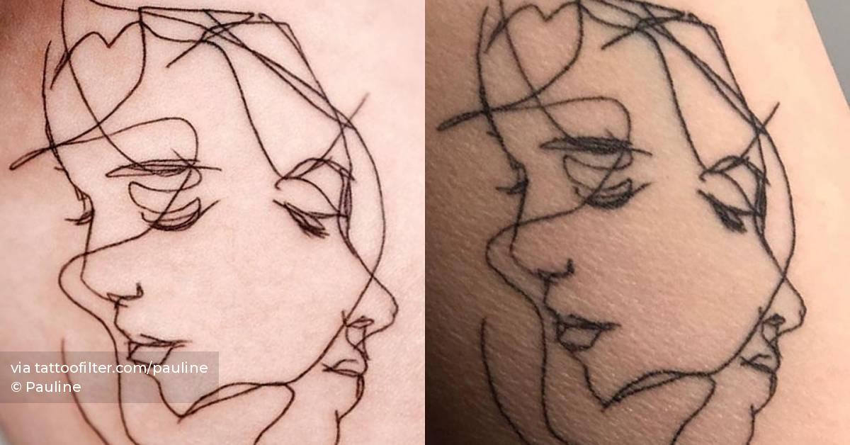 Fresh and healed faces tattoo done on the inner arm,
