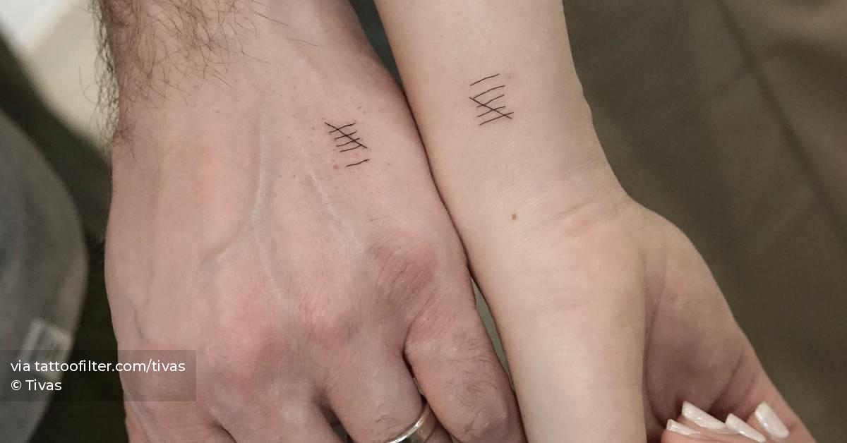 Matching tally mark tattoo for siblings.