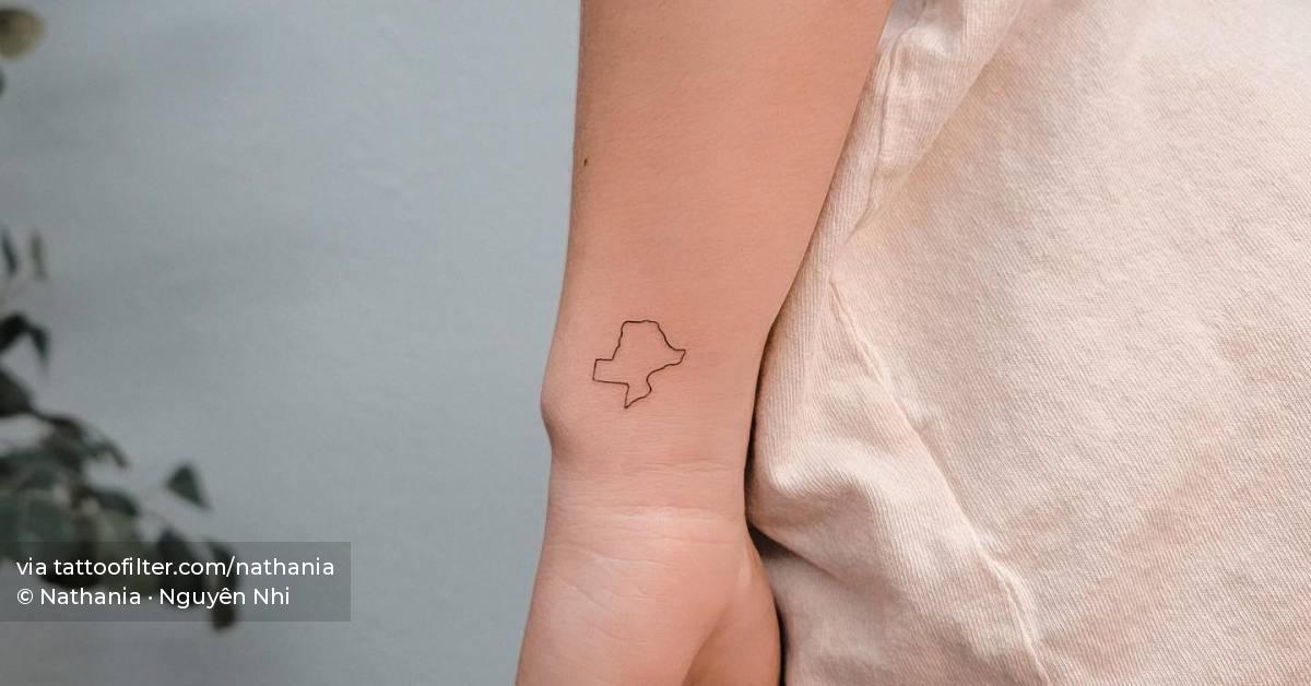Little minimalistic texas map tattoo located on the