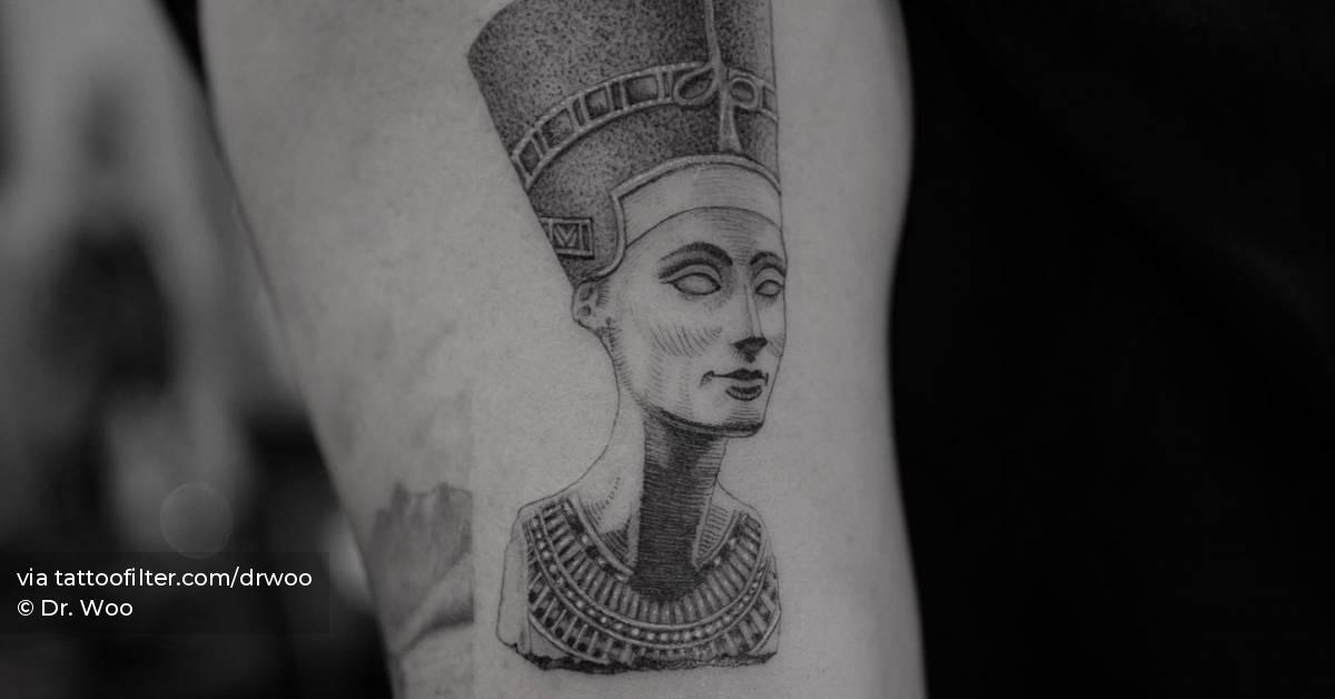 Micro-realistic Nefertiti tattoo located on the bicep.
