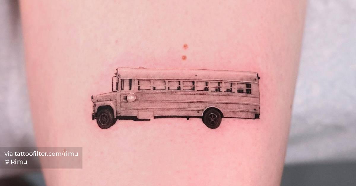 School bus tattoo located on the thigh, micro-realistic
