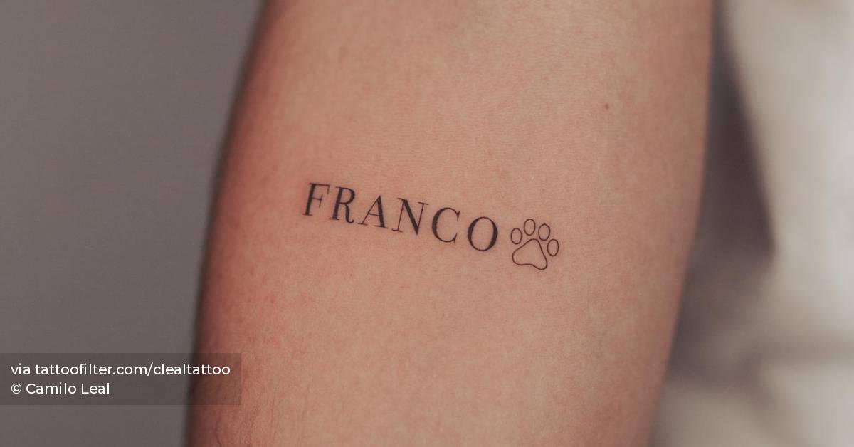 Name "Franco" and dog paw tattoo located on the inner