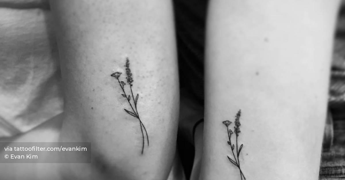 Matching flowers tattoo for couple.