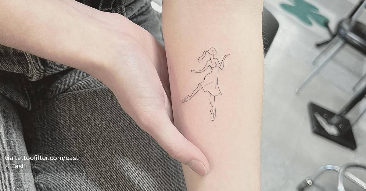 Fine line style ballerina tattooed on the inner